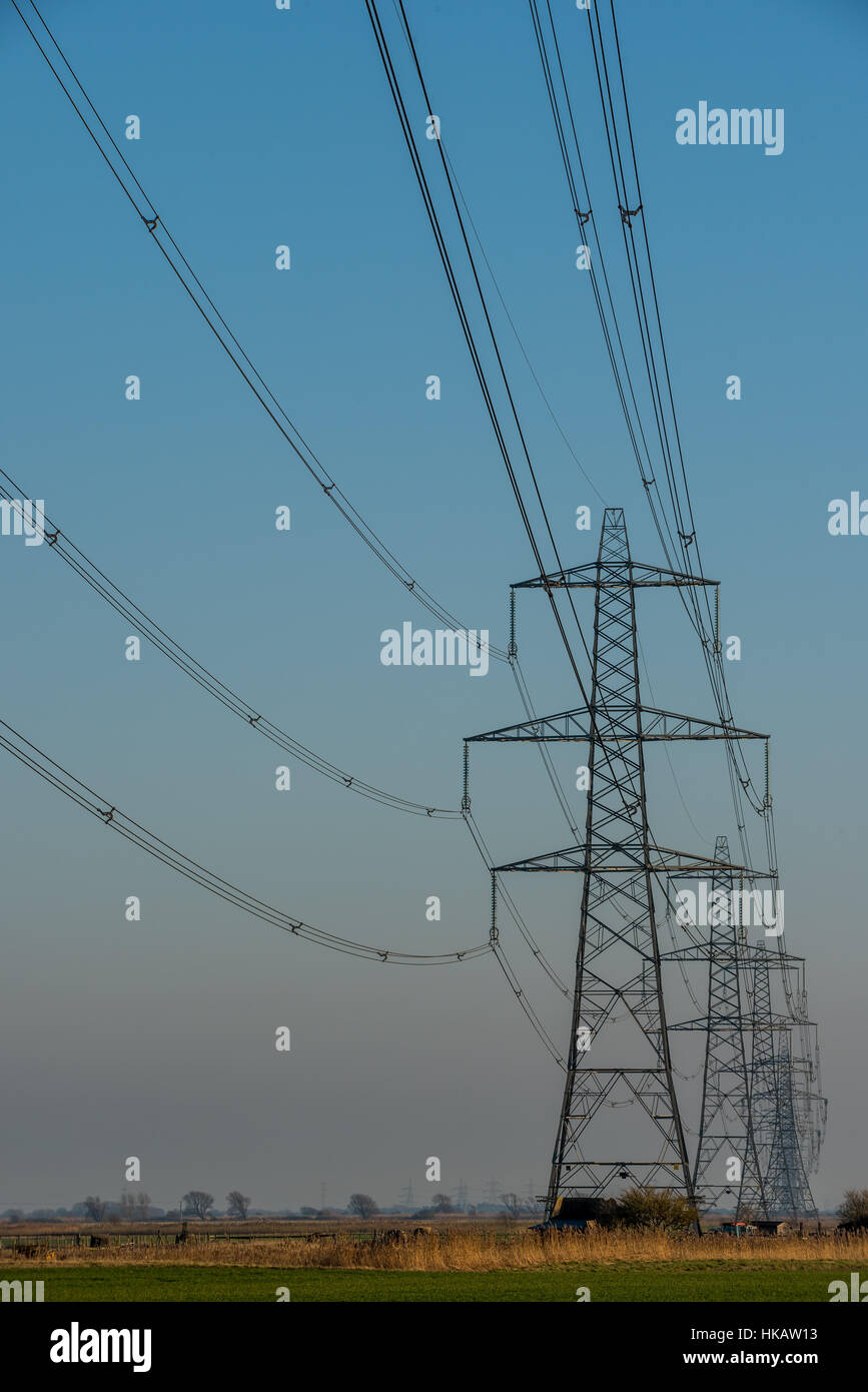 Electricity pylons at Romney Marsh on the Kent and Sussex border Stock ...