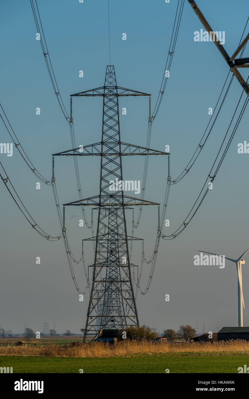 Electricity pylons at Romney Marsh on the Kent and Sussex border Stock ...