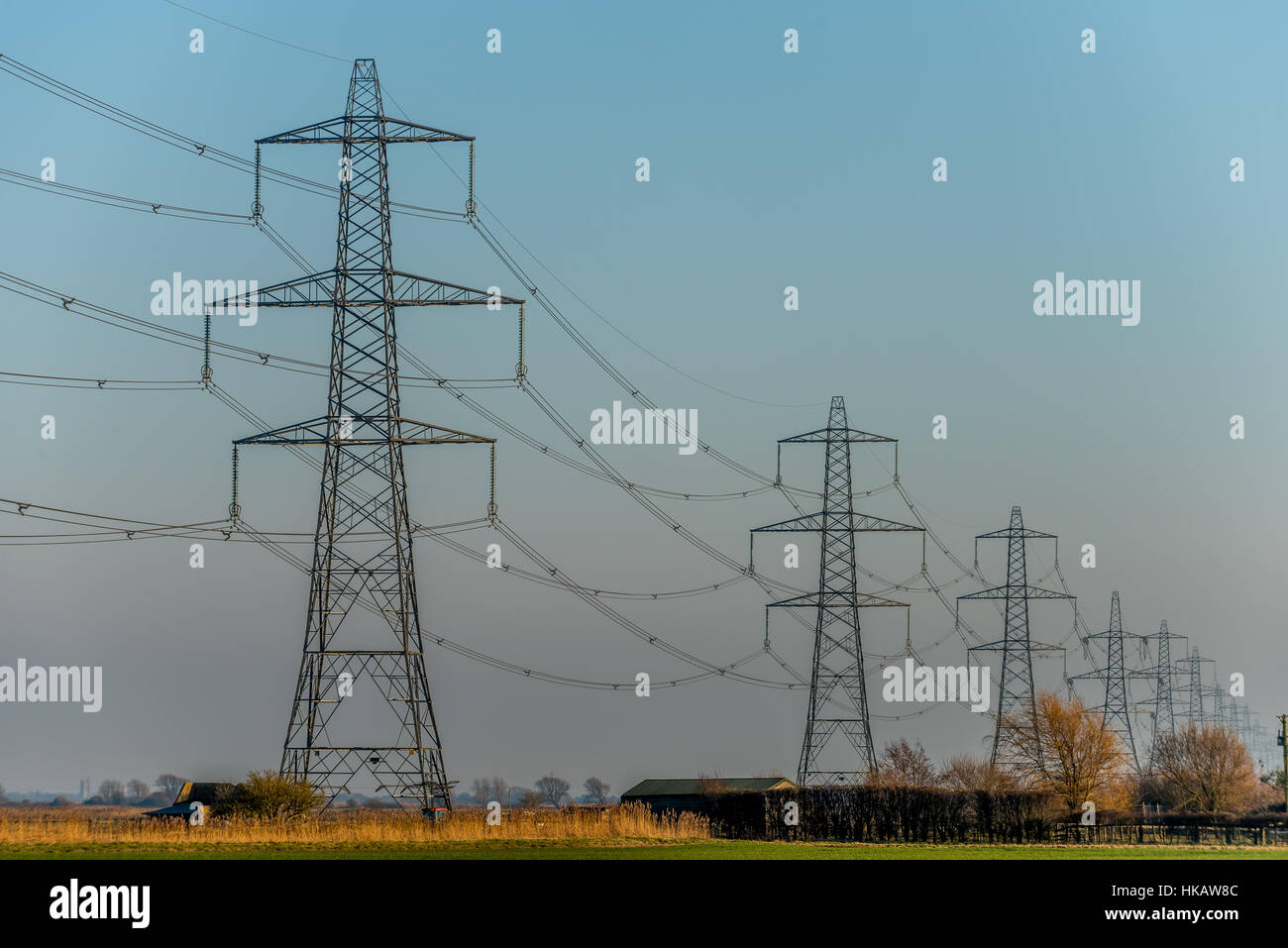 Electricity pylons at Romney Marsh on the Kent and Sussex border Stock ...