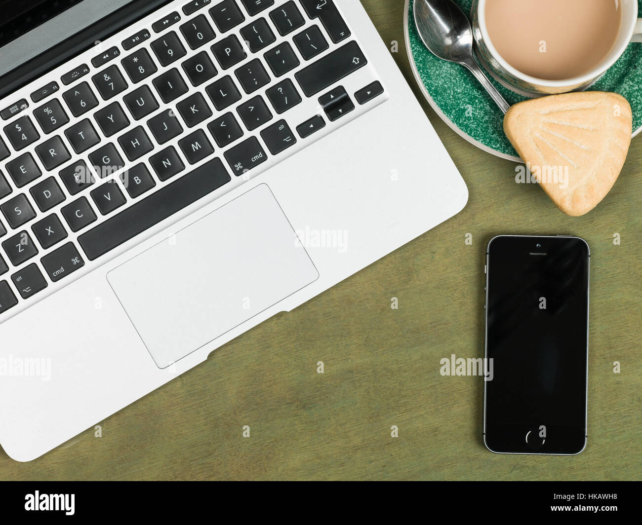 Open laptop with a tea cup hi-res stock photography and images - Alamy