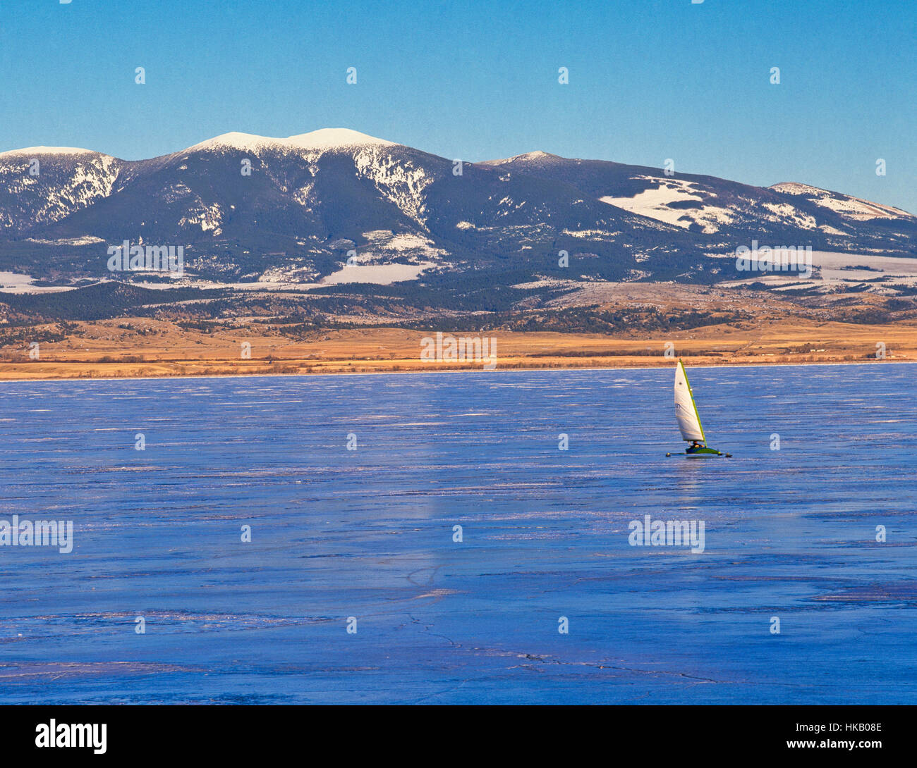 ice boat sailing on frozen canyon ferry lake below the big belt ...