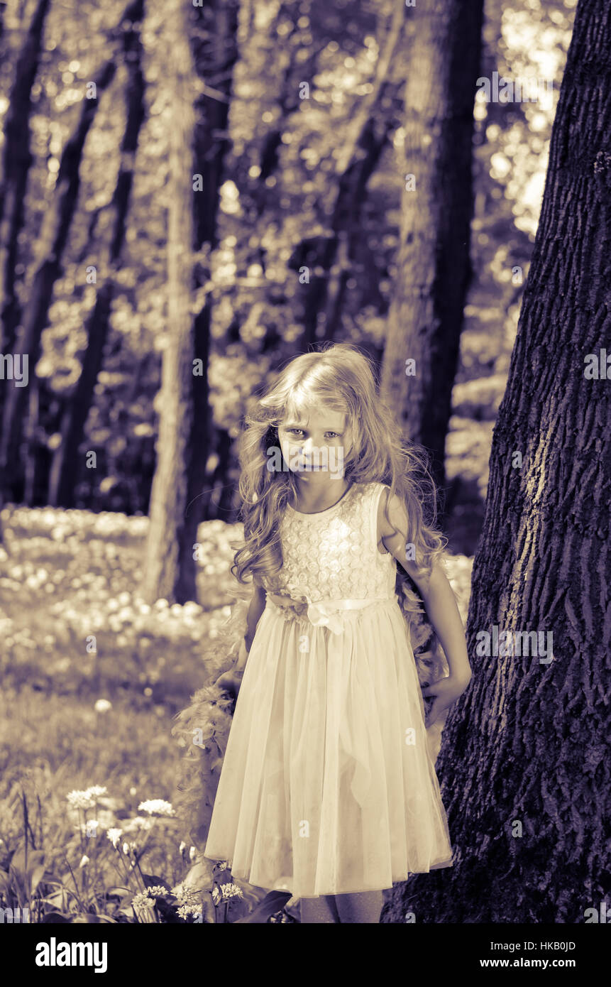 lovely little child in forest monochrome Stock Photo - Alamy