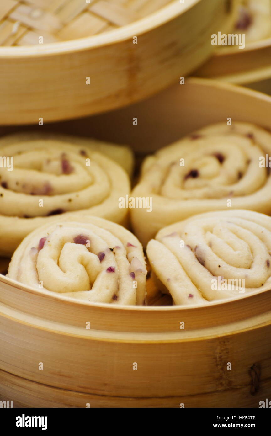 Homemade chinese steamed bread buns Mantou with red onions, sesame oil ...