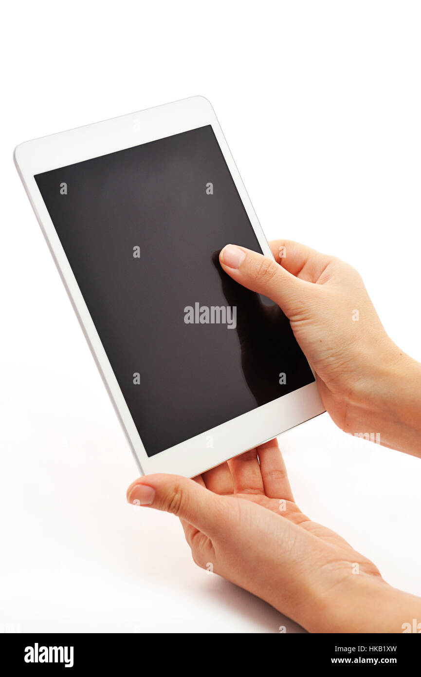 person holding white tablet with hands Stock Photo - Alamy