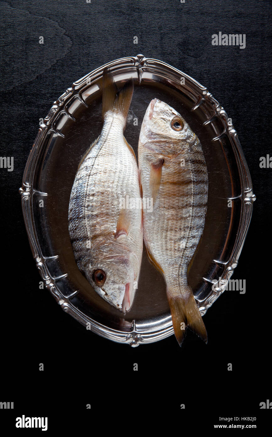 raw fish with cooking ingredients Stock Photo - Alamy