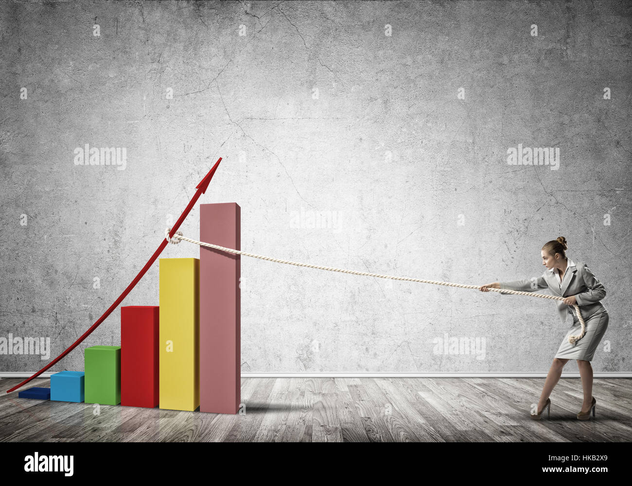 Businesswoman pulling graph with rope as symbol of power and control ...