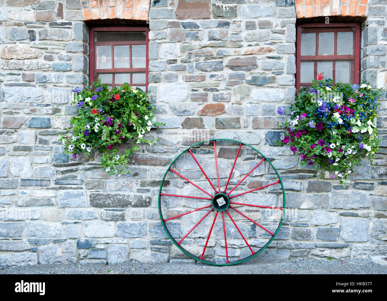 Interesting Two windows with flowers Stock Photo - Alamy
