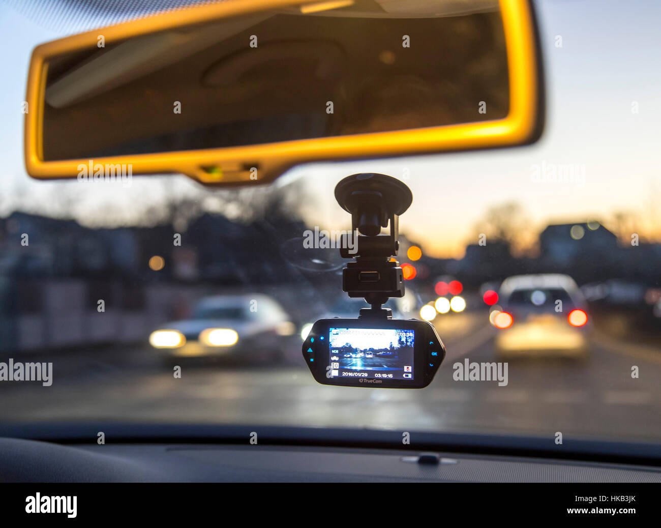 Dashcam in a passenger car, video camera on the windshield, permanently ...