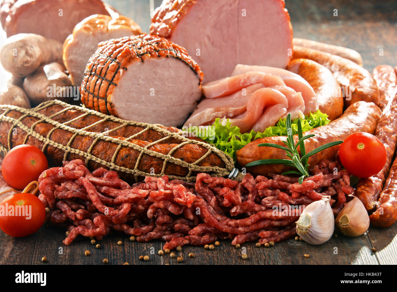 Assorted meat products including ham and sausages Stock Photo - Alamy
