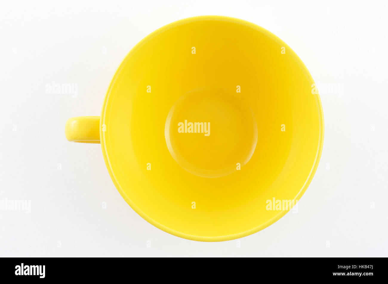 yellow empty plate on white background Stock Photo - Alamy