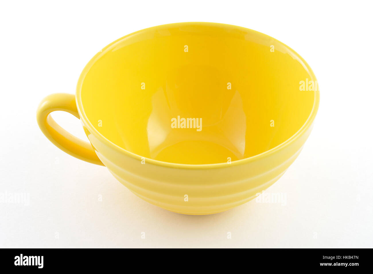 yellow empty plate on white background Stock Photo - Alamy