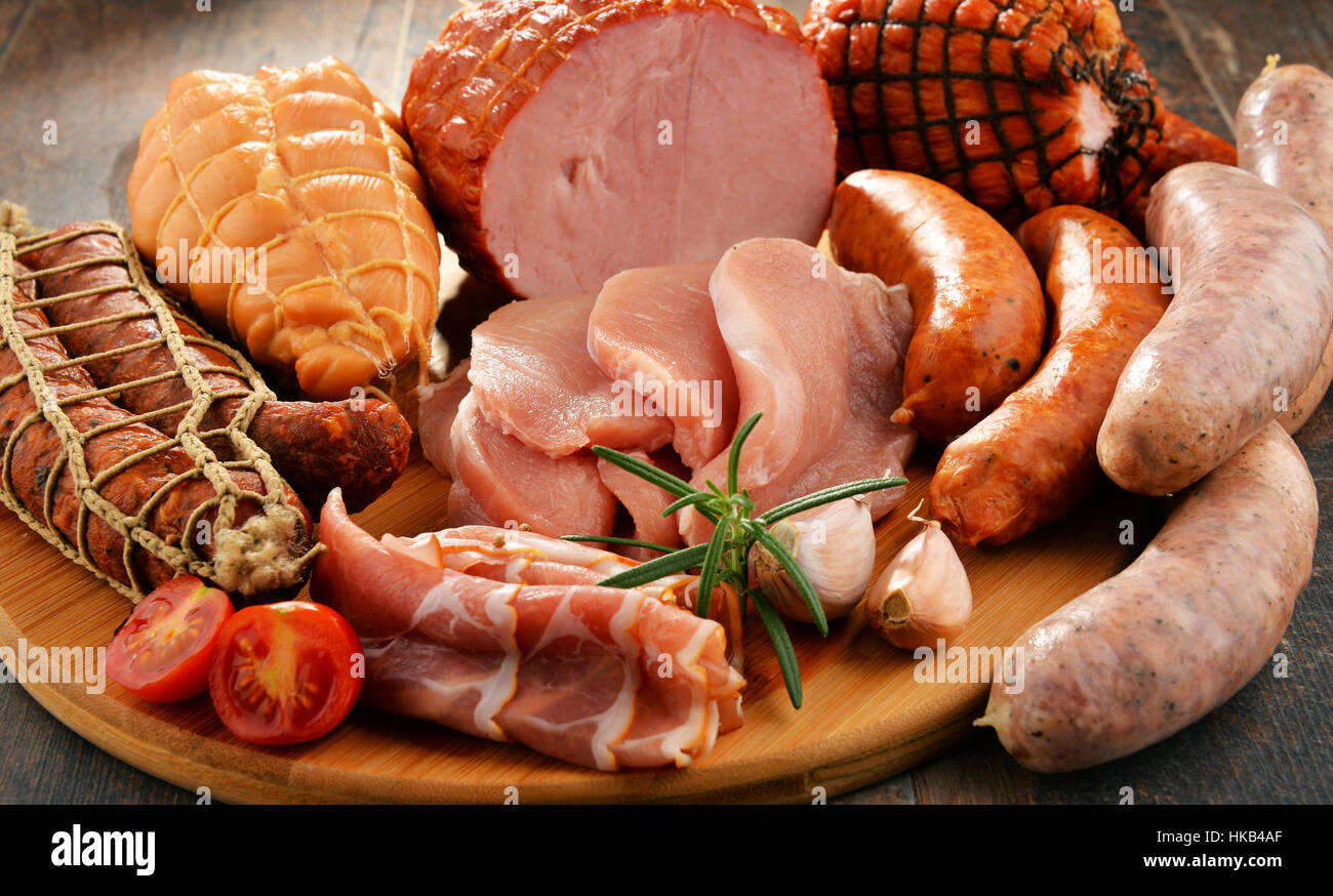Assorted meat products including ham and sausages Stock Photo - Alamy
