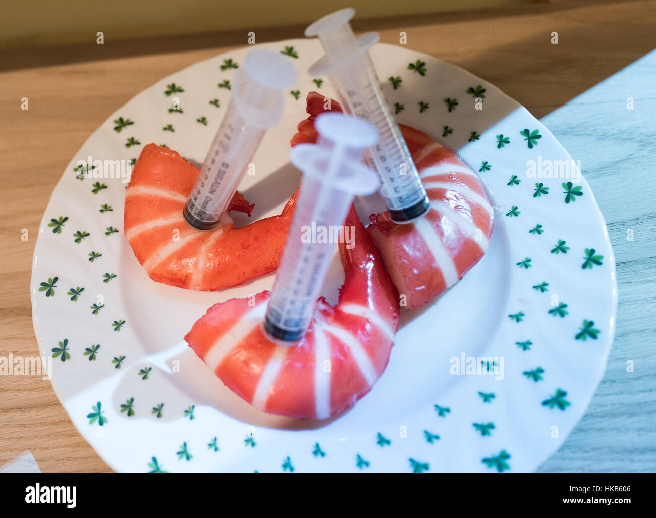 Berlin, Germany. 17th Jan, 2017. Syringes in plastic prawns on display ...