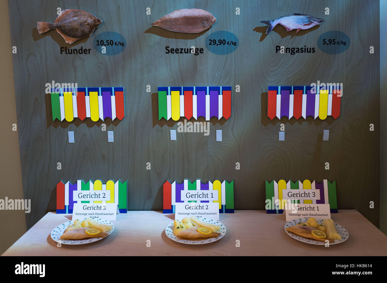 Berlin, Germany. 26th Jan, 2017. Three identical fish dishes with ...