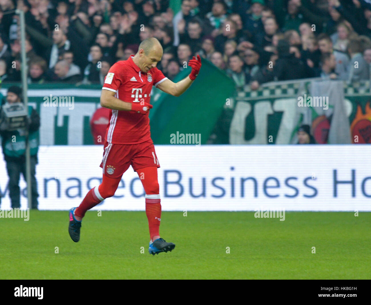 Bremen, Germany. 28th Jan, 2017. Munich's Arjen Robben celebrates his 0 ...