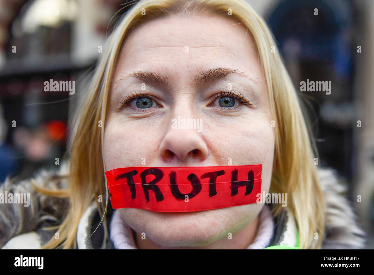 Covered mouth protester hi-res stock photography and images - Alamy