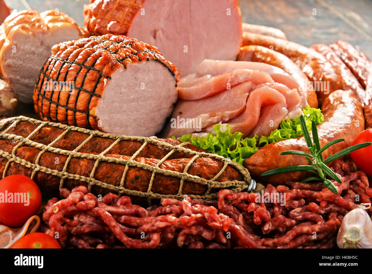 Assorted meat products including ham and sausages Stock Photo - Alamy
