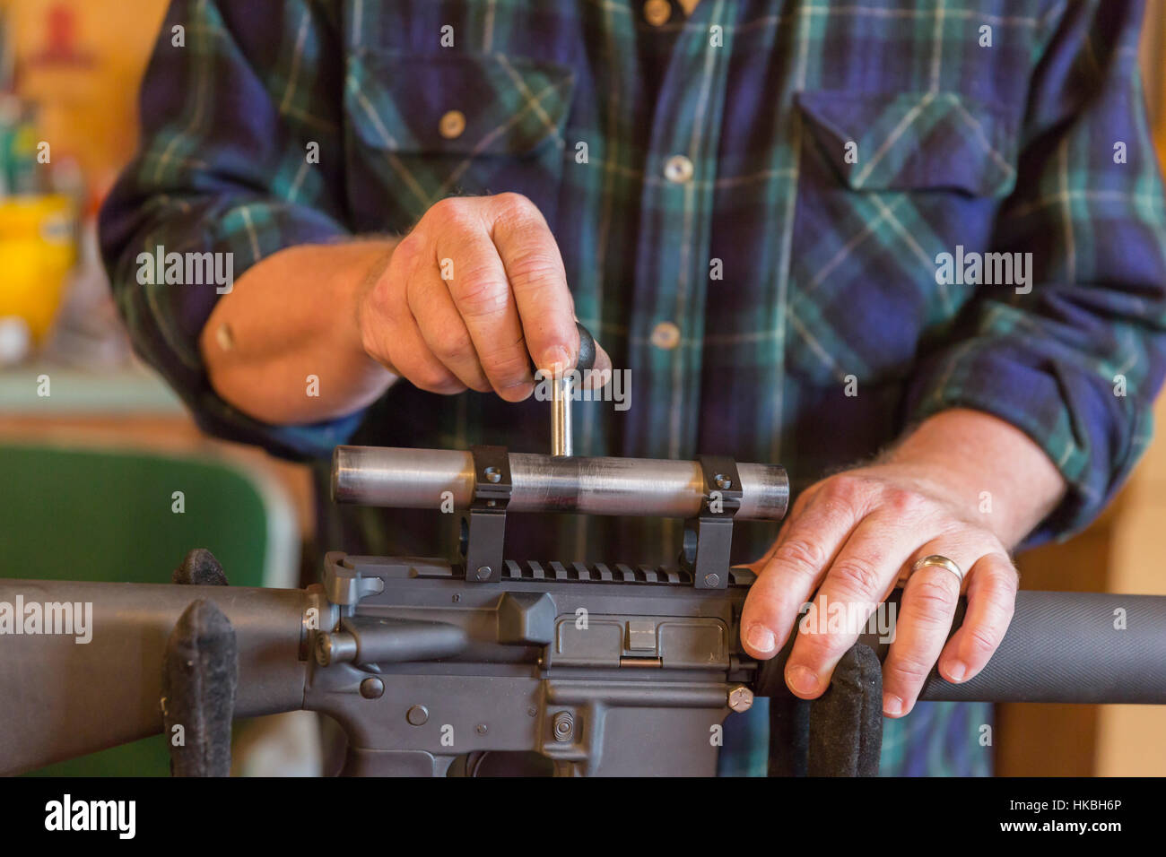 Fitting lapping bar into scope rings Stock Photo - Alamy