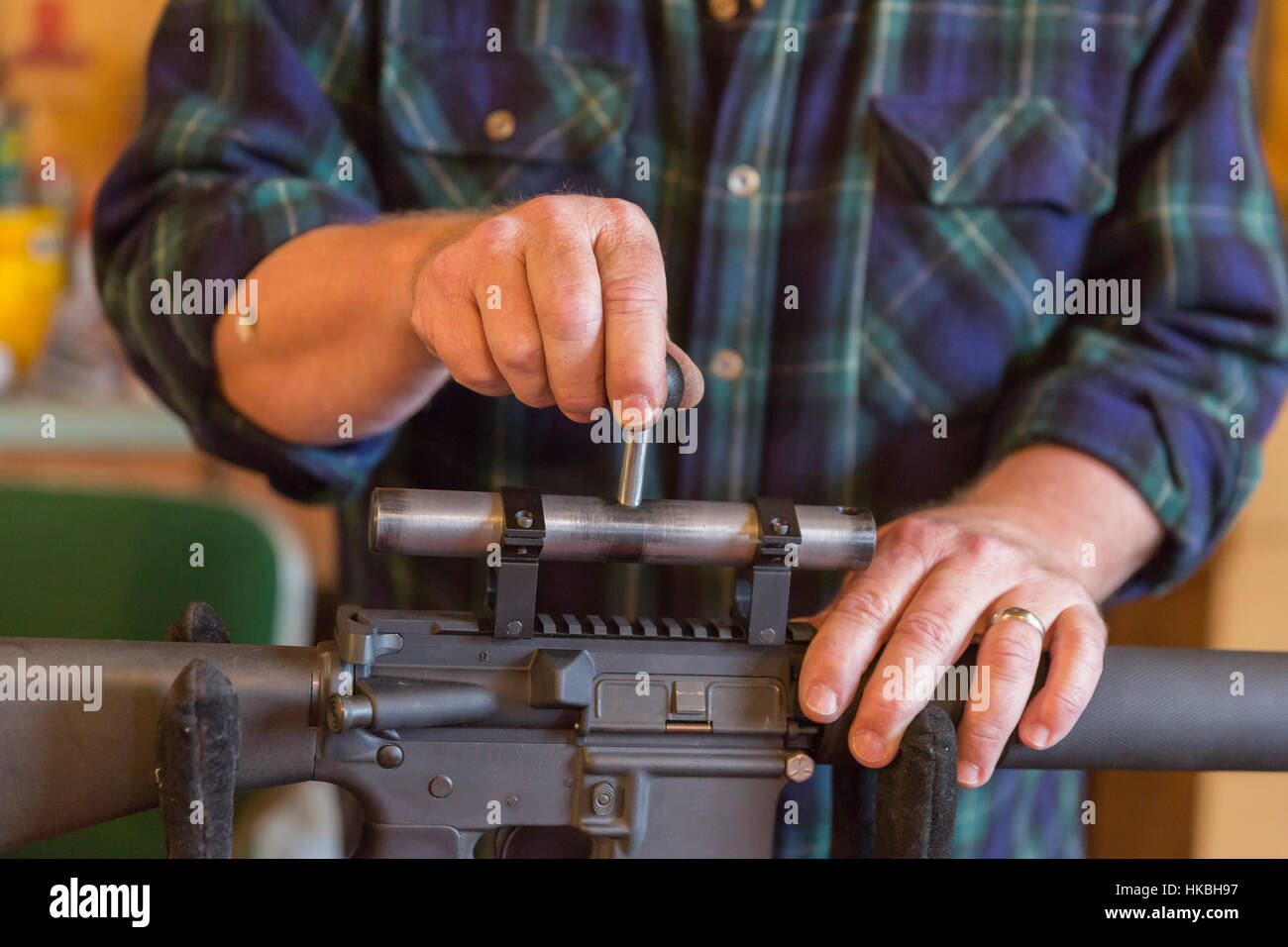Fitting lapping bar into scope rings Stock Photo - Alamy