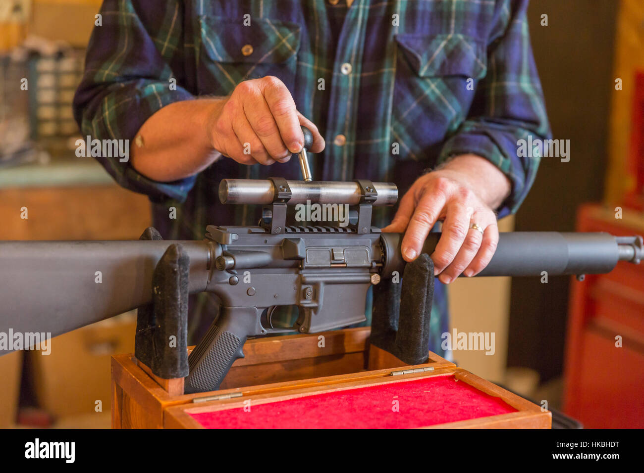 Fitting lapping bar into scope rings Stock Photo - Alamy
