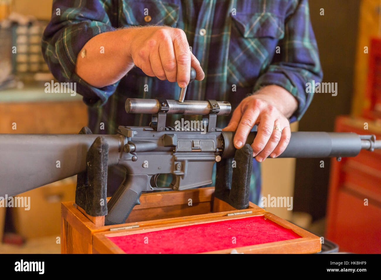 Fitting lapping bar into scope rings Stock Photo - Alamy