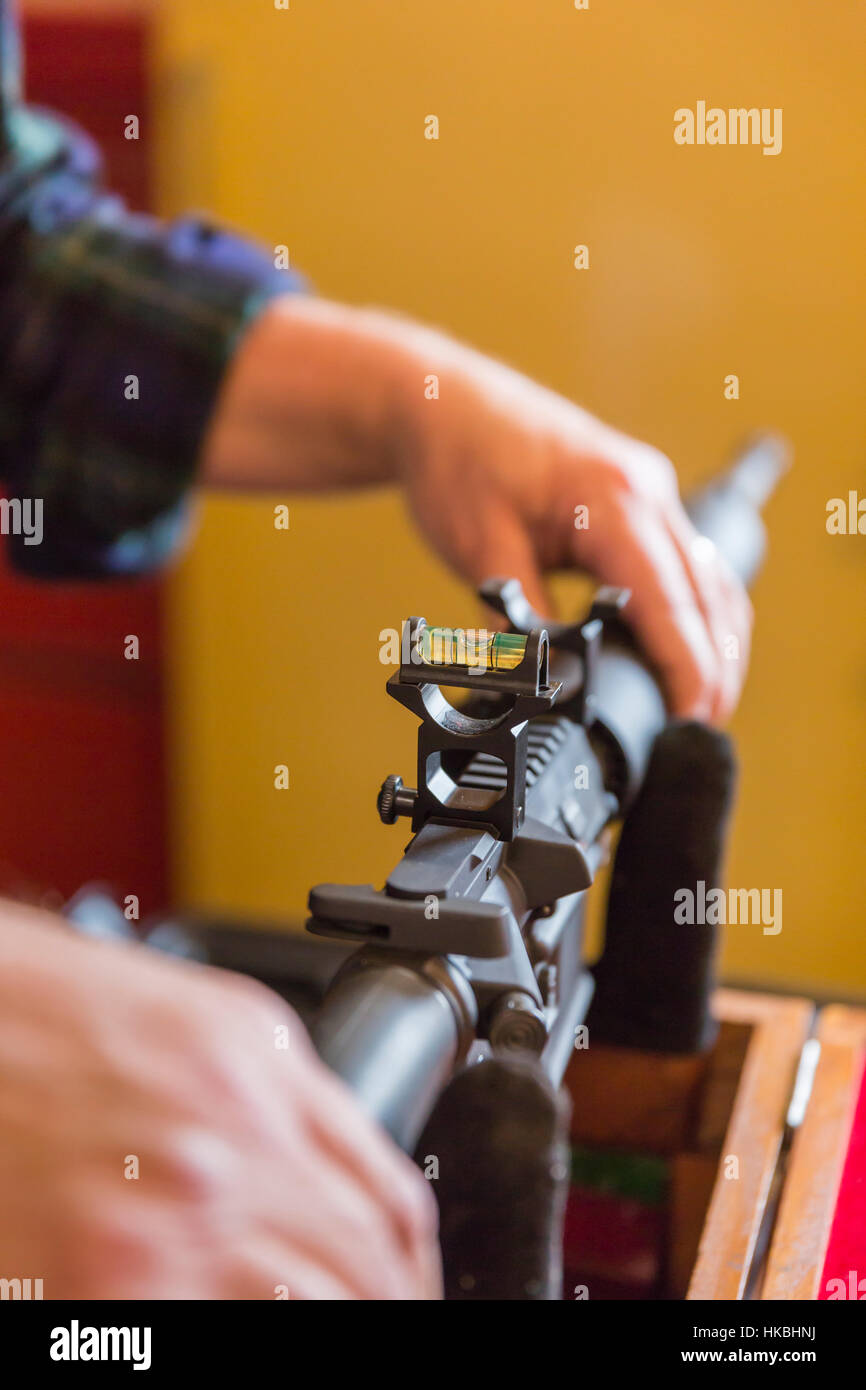 Leveling Colt AR 15 rifle prior to mounting scope Stock Photo - Alamy