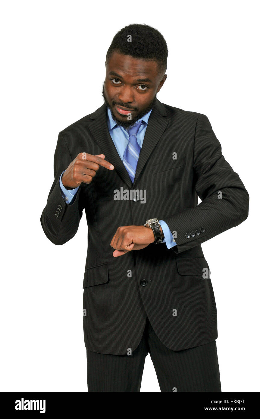 Boss man telling someone theyre late by pointing at his watch Stock ...