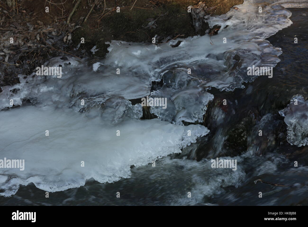 Frozen River in a winter landscape Stock Photo - Alamy