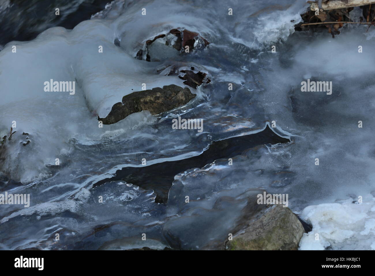 Frozen River in a winter landscape Stock Photo - Alamy