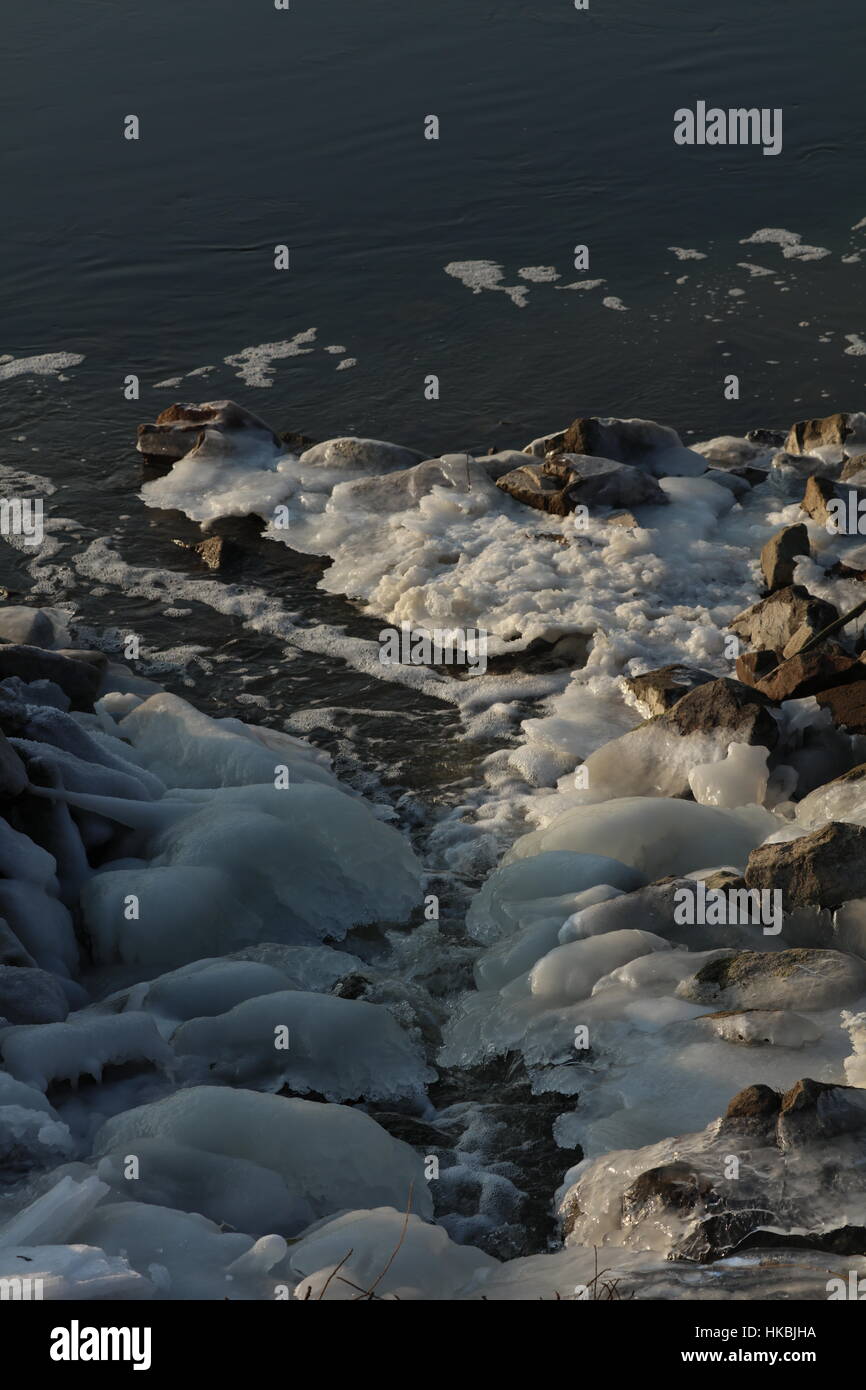 Frozen River in a winter landscape Stock Photo - Alamy
