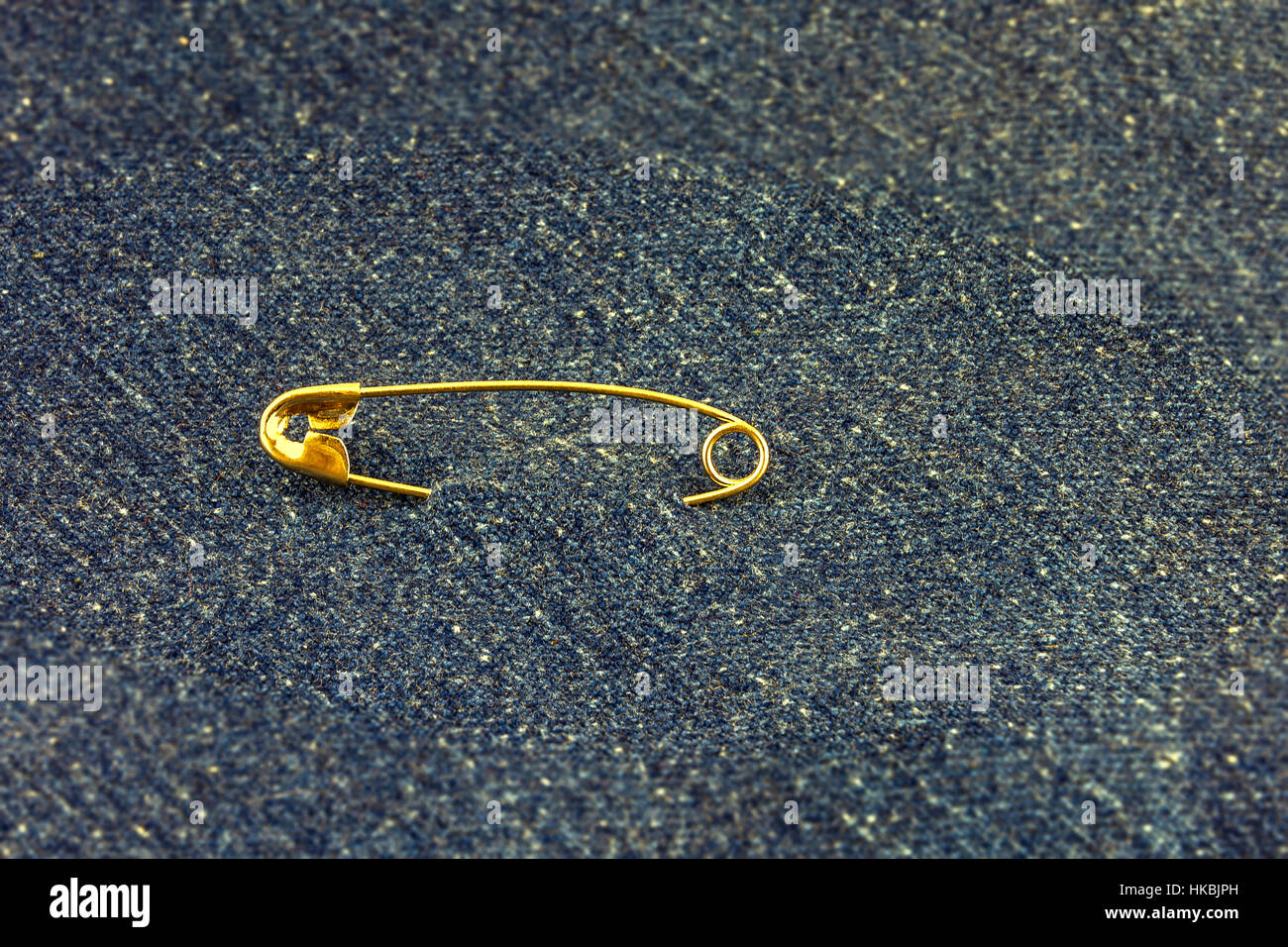 Metal pin buckle with hollow threaded through the blue denim Stock ...