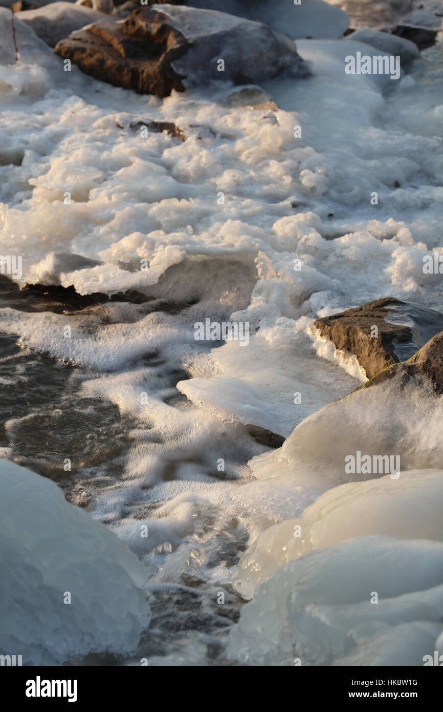 Frozen River in a winter landscape Stock Photo - Alamy