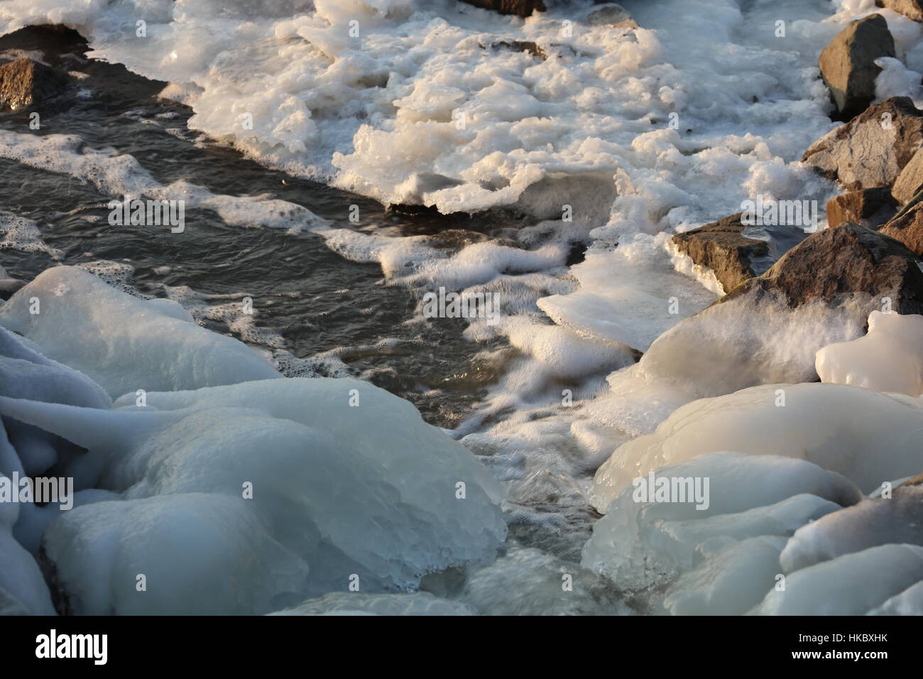 Frozen River in a winter landscape Stock Photo - Alamy