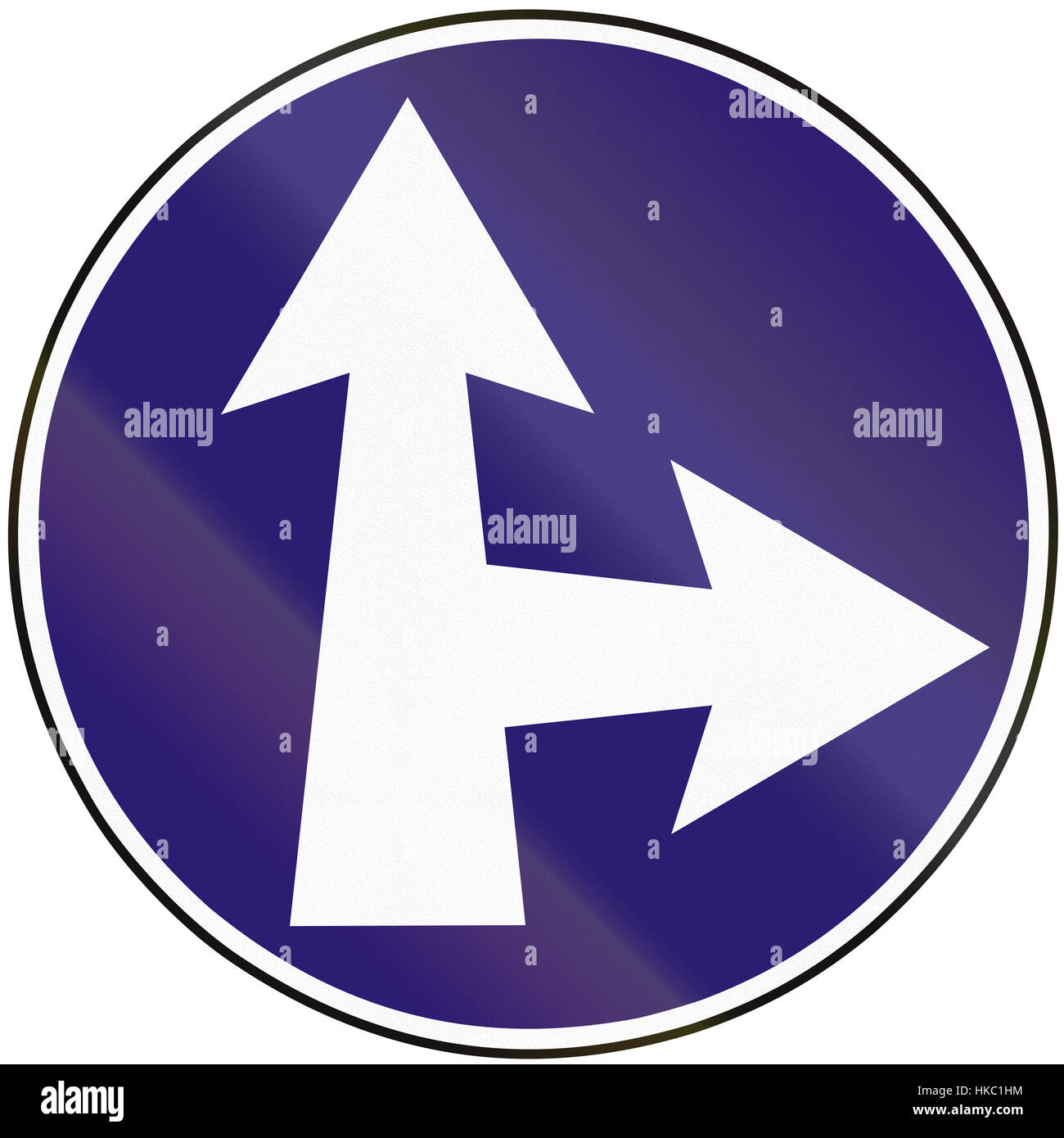 Road sign used in Slovakia - Straight or turn right Stock Photo - Alamy