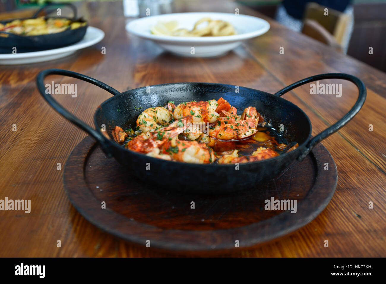 Traditional Spanish dish gambas al ajillo (shrimp with garlic Stock ...