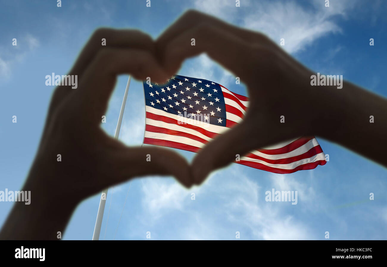 hands show signs of heart and American flag Stock Photo - Alamy