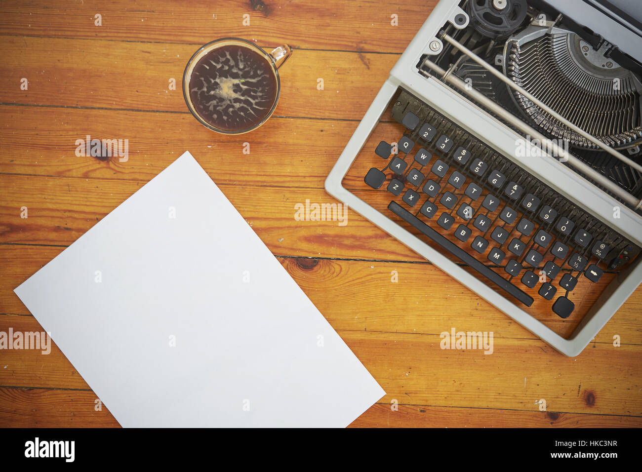 Vintage typewriter on wooden background Stock Photo - Alamy