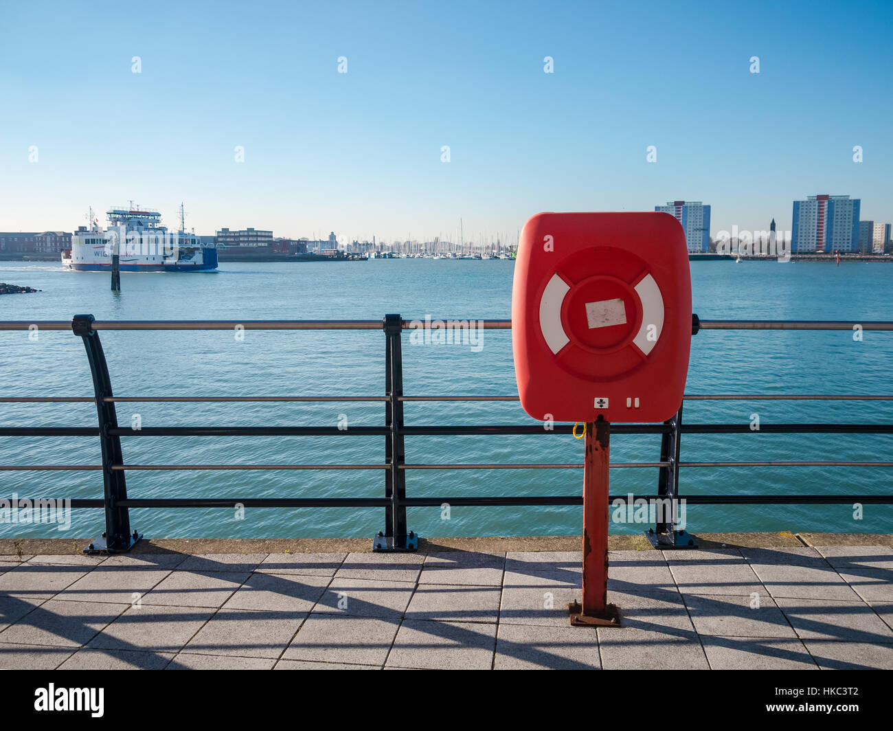 A lifebuoy on the promenade beside the sea Stock Photo - Alamy