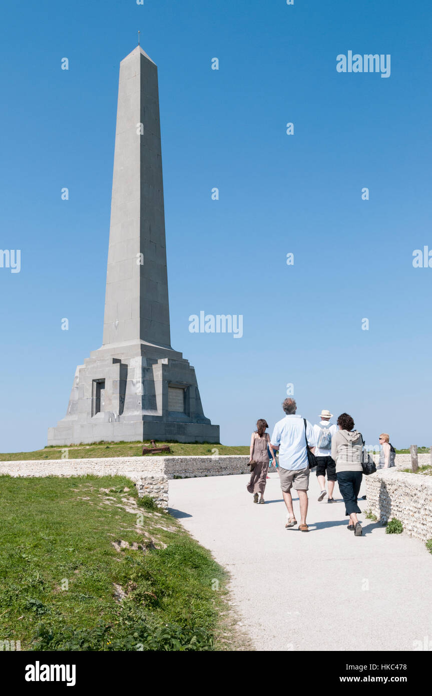 A small group of visitors walk towards the Dover Patrol Obelisk ...