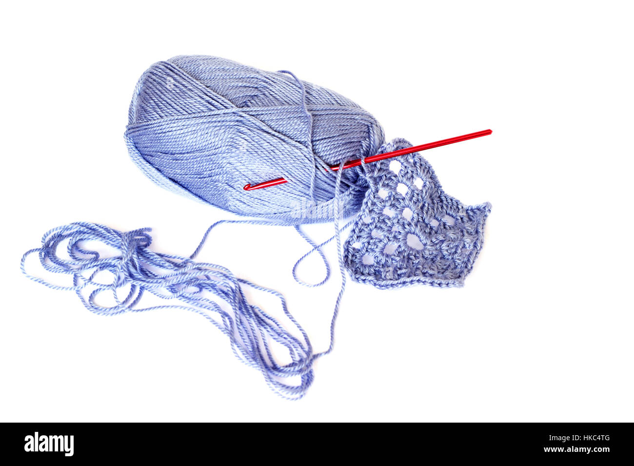 Light blue skein of acrylic thread with the unwound string, square ...