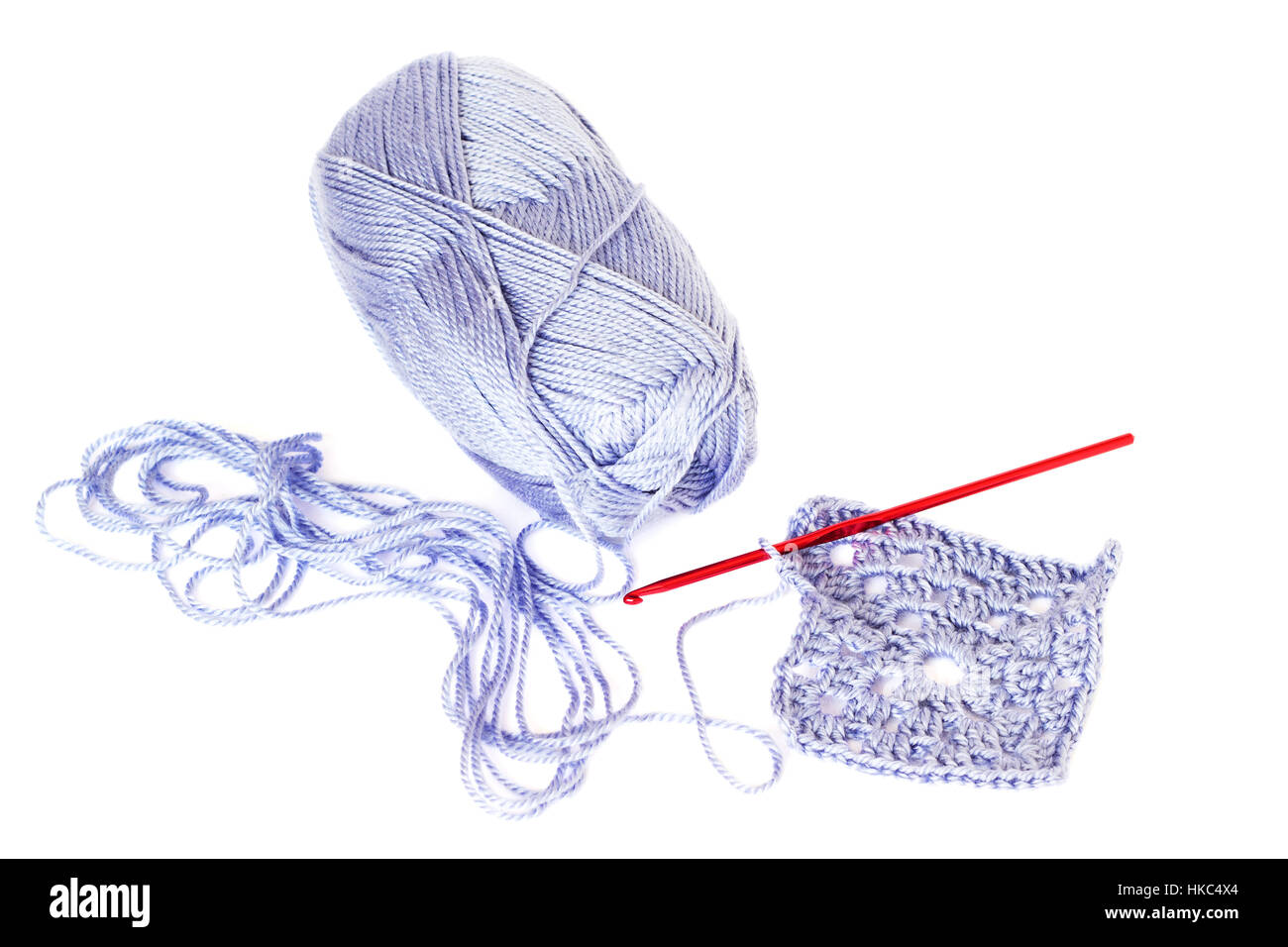 Light blue skein of acrylic thread with the unwound string, square ...