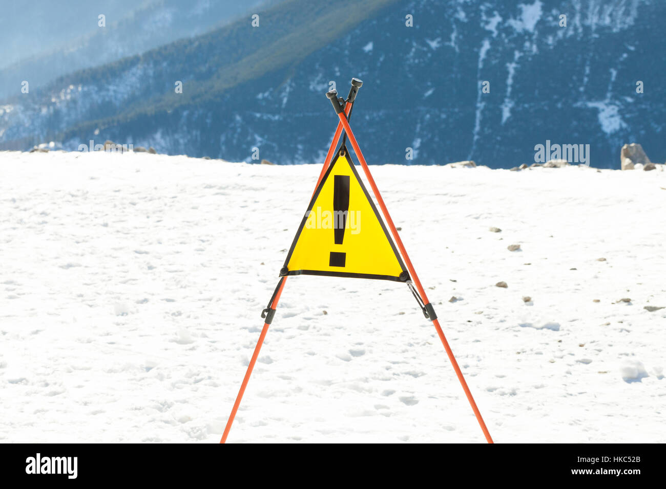 Close up shot of a caution sign at a slope of a ski resort Stock Photo ...