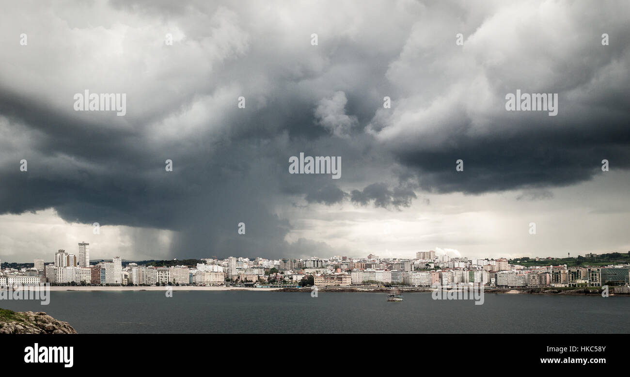 Heavy storm with rain and dramatic clouds over the city center of A ...