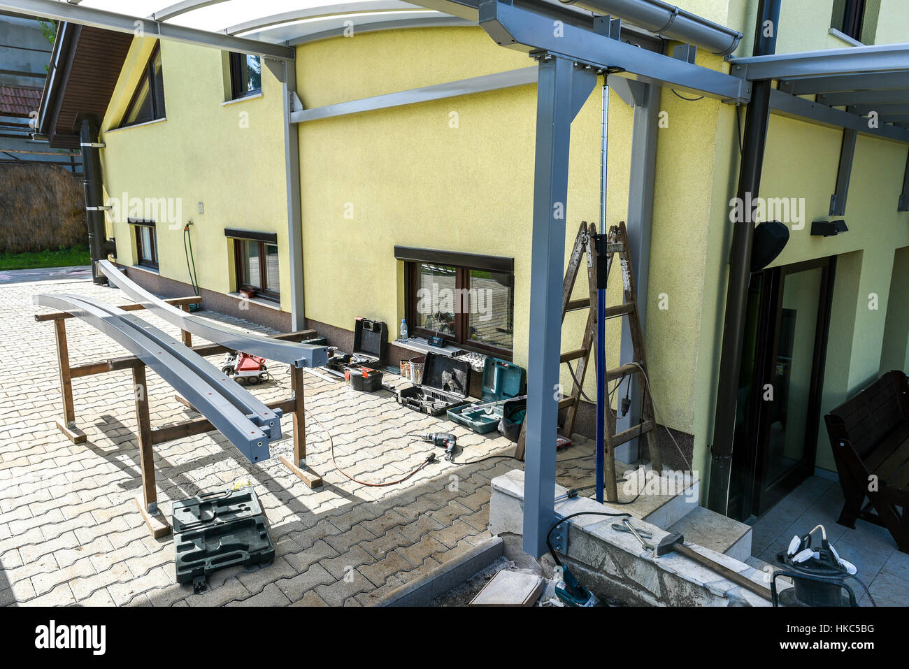 Building a canopies on a residential house. Building a metal ...