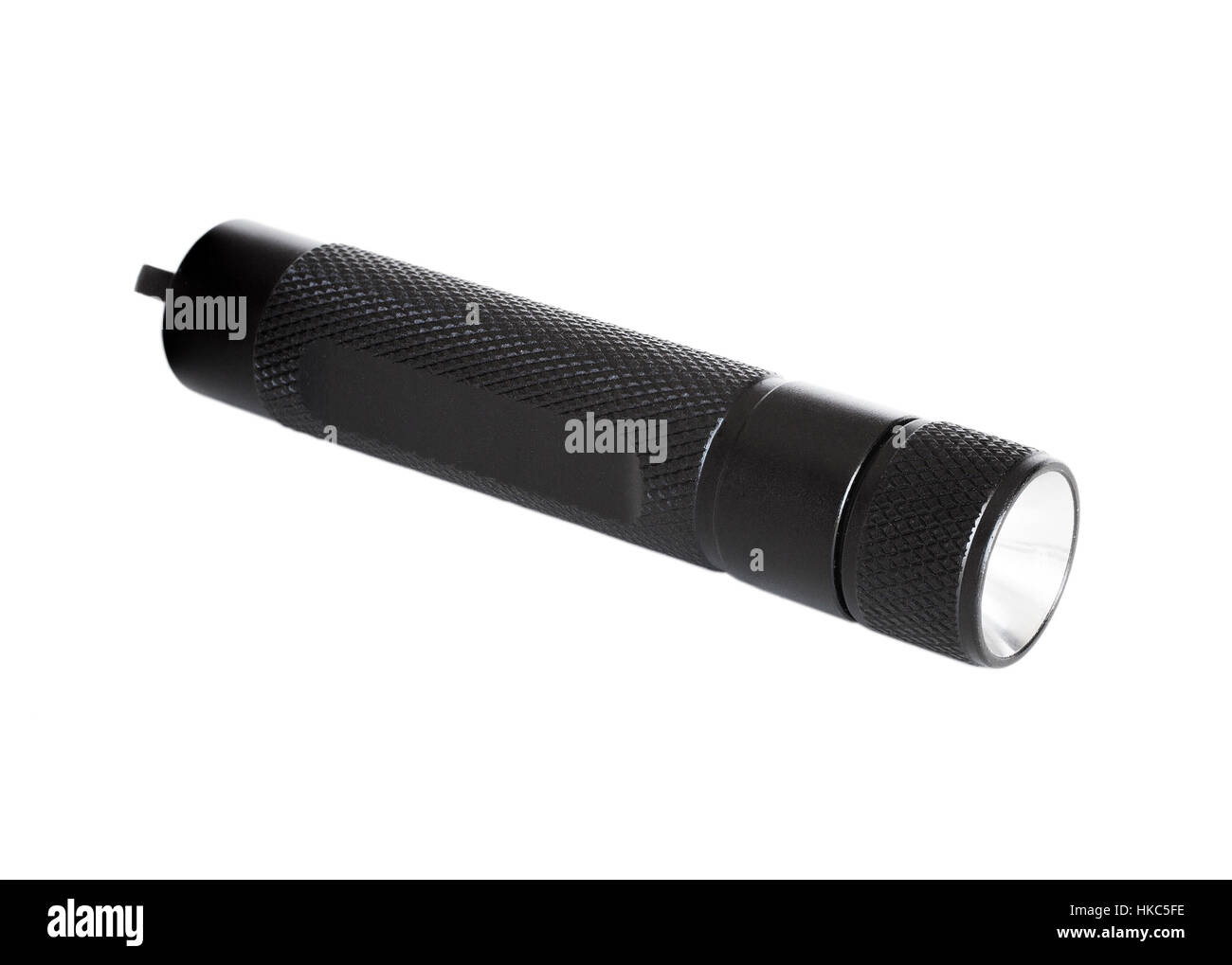 small flashlight with a metal body isolated on white Stock Photo - Alamy
