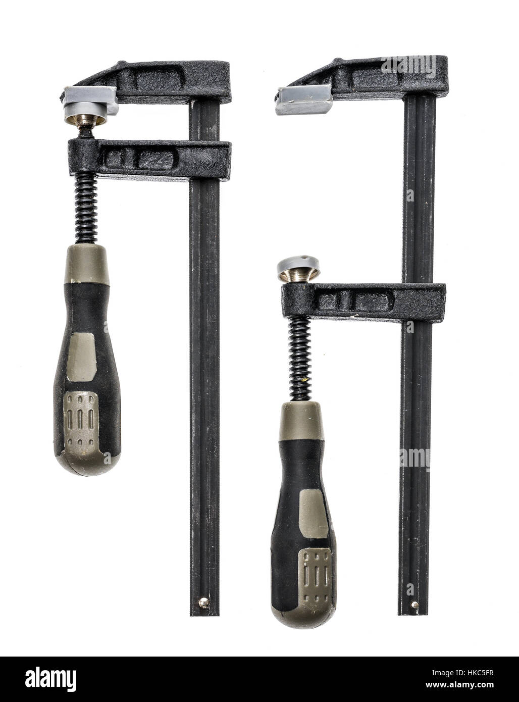 Two black and grey Carpenter clamp isolated on white background ...