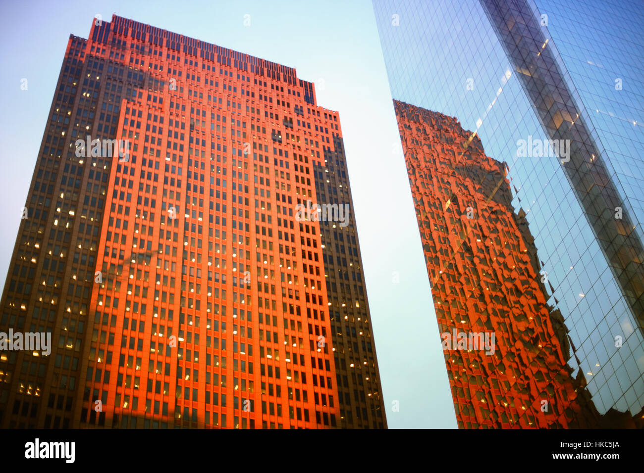 Mirror reflection of a red skyscraper in a windows Stock Photo - Alamy