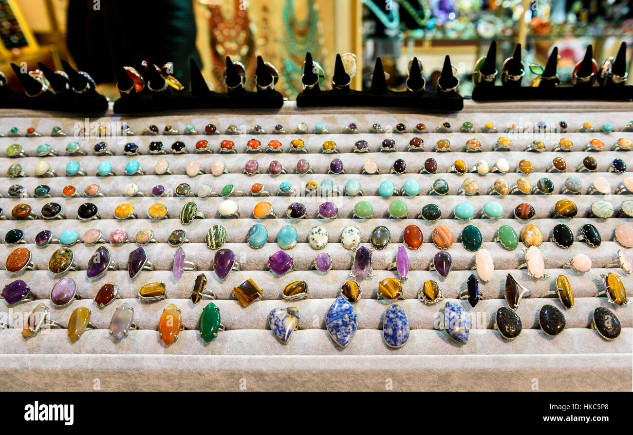Display with different design of handmade rings with stones beads ...
