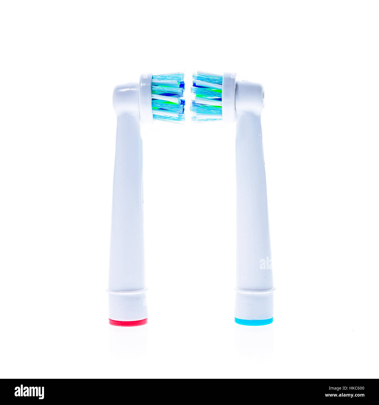 Electric Toothbrush replacement heads with color rings, isolated on ...