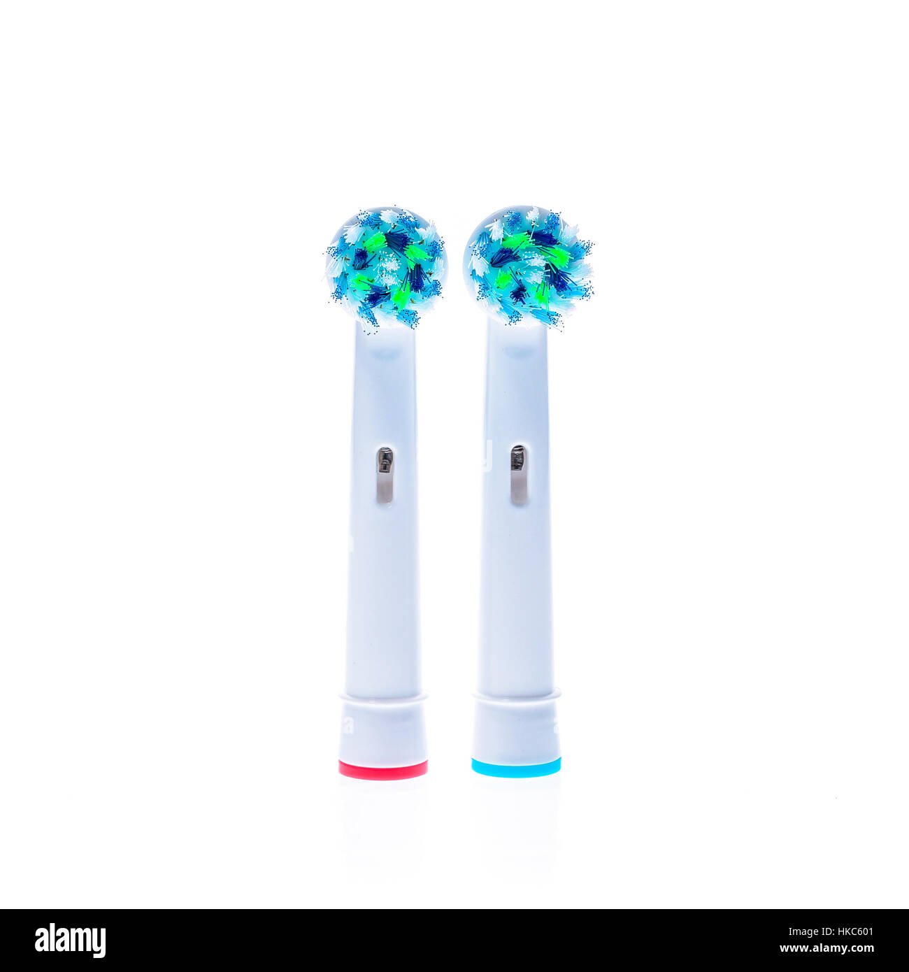 Electric Toothbrush replacement heads with color rings, isolated on ...